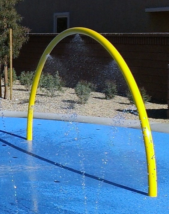 Water Arch Splash Pad Feature by Rain Deck